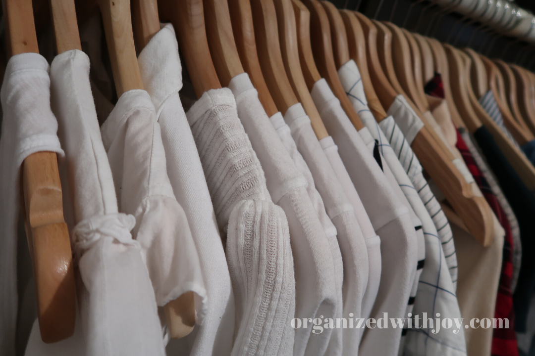 7 Reasons We Keep Clothes + Ideas To Declutter Clothes | organized with joy